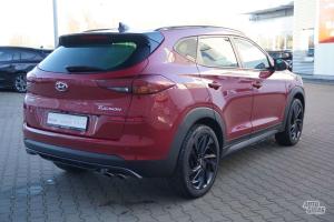 Red Hyundai Tucson 2020 in Kaunas, with an engine capacity of 1.60 L and mileage of 60 thousand km for 28570 €, photo 6 on AUTOMOTO.COM.LV