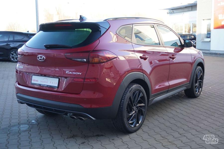 Red Hyundai Tucson 2020 in Kaunas, with an engine capacity of 1.60 L and mileage of 60 thousand km for 28570 €, photo 6 on AUTOMOTO.COM.LV