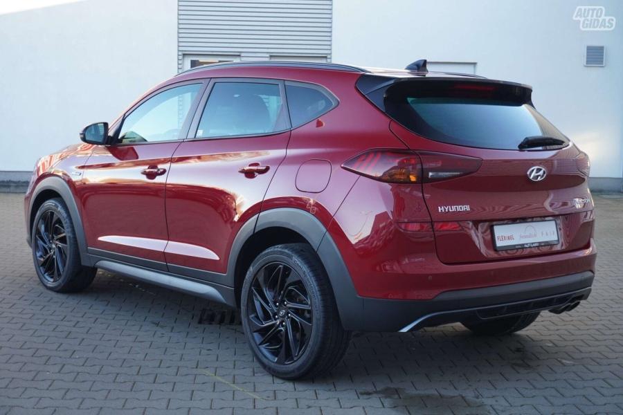 Red Hyundai Tucson 2020 in Kaunas, with an engine capacity of 1.60 L and mileage of 60 thousand km for 28570 €, photo 8 on AUTOMOTO.COM.LV