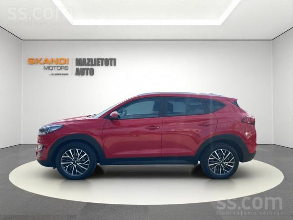 Red Hyundai Tucson 2020 in Riga, with an engine capacity of 1.60 L and mileage of 143 thousand km for 15990 €, photo 3 on AUTOMOTO.COM.LV