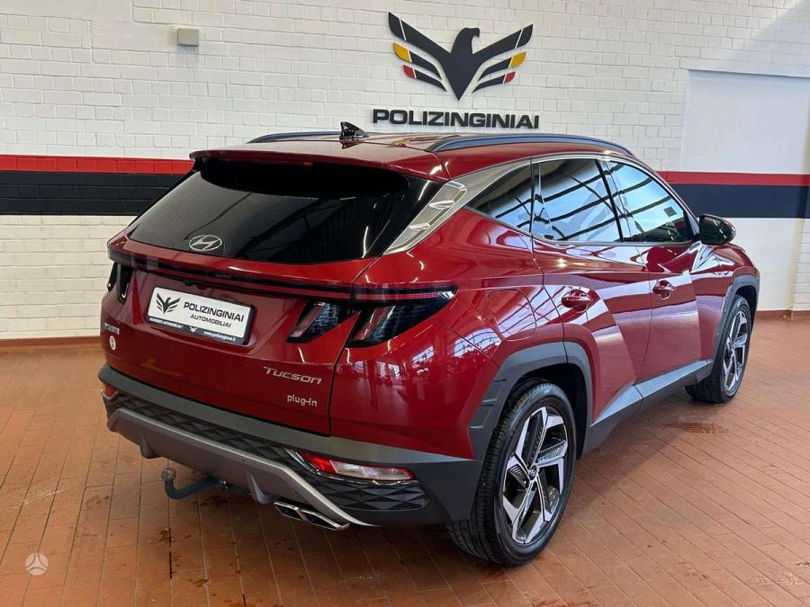 Red Hyundai Tucson 2021 in Kaunas, with an engine capacity of 1.60 L and mileage of 95 thousand km for 21600 €, photo 4 on AUTOMOTO.COM.LV