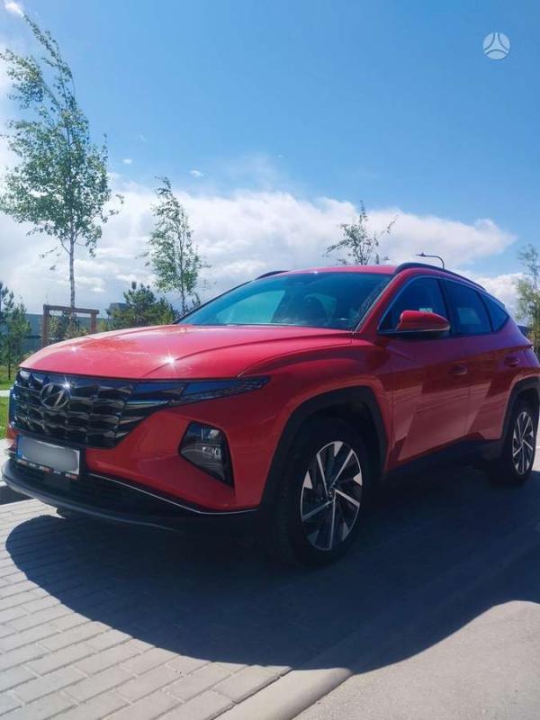 Sarkans Hyundai Tucson 2021 Viļņa, ar dzinēja tilpumu 1.60 L un nobraukumu 15 tūkst. km par 21949 €, foto 1 vietnē AUTOMOTO.COM.LV