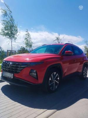 Red Hyundai Tucson 2021 in Vilnius, with an engine capacity of 1.60 L and mileage of 15 thousand km for 21949 €, photo  on AUTOMOTO.COM.LV
