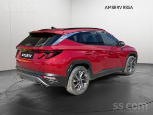 Sarkans Hyundai Tucson 2021 Rīga, ar dzinēja tilpumu 1.60 L un nobraukumu 79 tūkst. km par 19400 €, foto 3 vietnē AUTOMOTO.COM.LV
