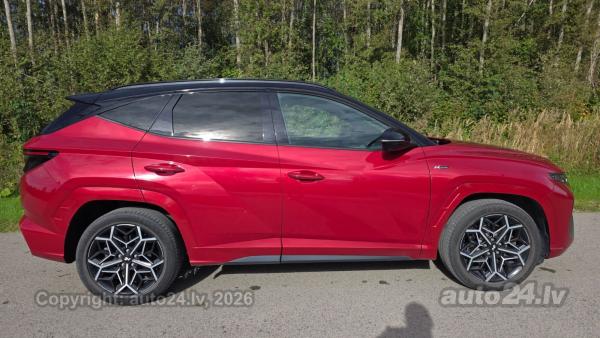 Red Hyundai Tucson 2021 in Tallinn, with an engine capacity of 1.60 L and mileage of 45 thousand km for 25999 €, photo 4 on AUTOMOTO.COM.LV