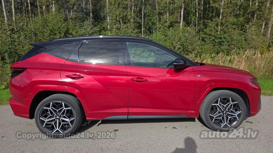 Red Hyundai Tucson 2021 in Tallinn, with an engine capacity of 1.60 L and mileage of 45 thousand km for 25999 €, photo 4 on AUTOMOTO.COM.LV