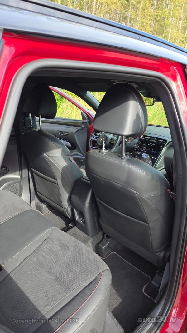 Red Hyundai Tucson 2021 in Tallinn, with an engine capacity of 1.60 L and mileage of 45 thousand km for 25999 €, photo 11 on AUTOMOTO.COM.LV