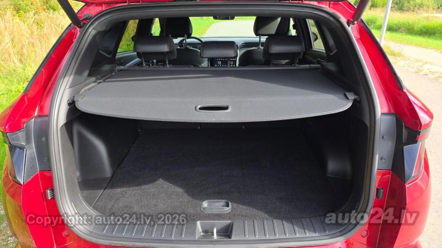 Red Hyundai Tucson 2021 in Tallinn, with an engine capacity of 1.60 L and mileage of 45 thousand km for 25999 €, photo 15 on AUTOMOTO.COM.LV