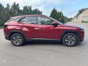 Red Hyundai Tucson 2022 in Vilnius, with an engine capacity of 1.60 L and mileage of 180 thousand km for 16500 €, photo 7 on AUTOMOTO.COM.LV