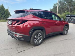 Red Hyundai Tucson 2022 in Vilnius, with an engine capacity of 1.60 L and mileage of 180 thousand km for 16500 €, photo 8 on AUTOMOTO.COM.LV