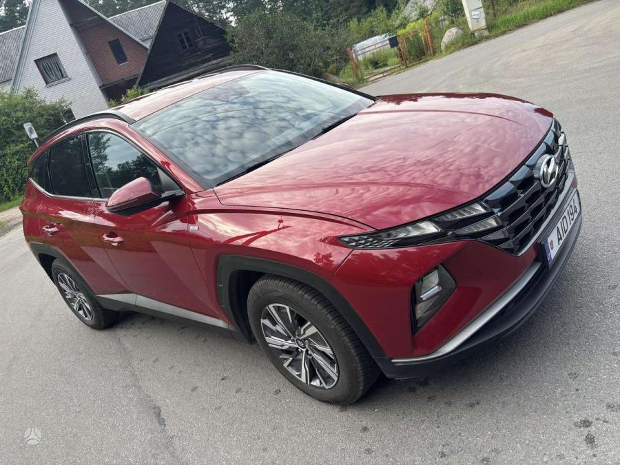 Red Hyundai Tucson 2022 in Vilnius, with an engine capacity of 1.60 L and mileage of 180 thousand km for 16500 €, photo 12 on AUTOMOTO.COM.LV