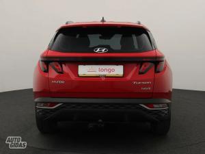 Red Hyundai Tucson 2023 in Vilnius, with an engine capacity of 1.60 L and mileage of 181 thousand km for 20899 €, photo 6 on AUTOMOTO.COM.LV