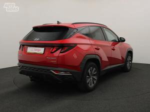 Red Hyundai Tucson 2023 in Vilnius, with an engine capacity of 1.60 L and mileage of 181 thousand km for 20899 €, photo 9 on AUTOMOTO.COM.LV