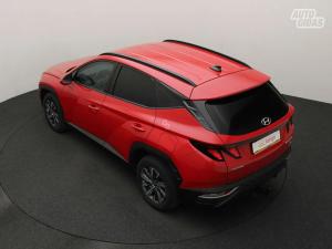 Red Hyundai Tucson 2023 in Vilnius, with an engine capacity of 1.60 L and mileage of 181 thousand km for 20899 €, photo 13 on AUTOMOTO.COM.LV