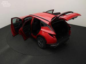 Red Hyundai Tucson 2023 in Vilnius, with an engine capacity of 1.60 L and mileage of 181 thousand km for 20899 €, photo 14 on AUTOMOTO.COM.LV