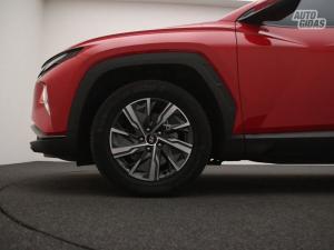 Red Hyundai Tucson 2023 in Vilnius, with an engine capacity of 1.60 L and mileage of 181 thousand km for 20899 €, photo 28 on AUTOMOTO.COM.LV