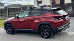 Red Hyundai Tucson 2023 in Riga, with an engine capacity of 1.60 L and mileage of 88 thousand km for 23650 €, photo 3 on AUTOMOTO.COM.LV