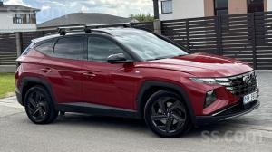 Red Hyundai Tucson 2023 in Riga, with an engine capacity of 1.60 L and mileage of 88 thousand km for 23650 €, photo 4 on AUTOMOTO.COM.LV