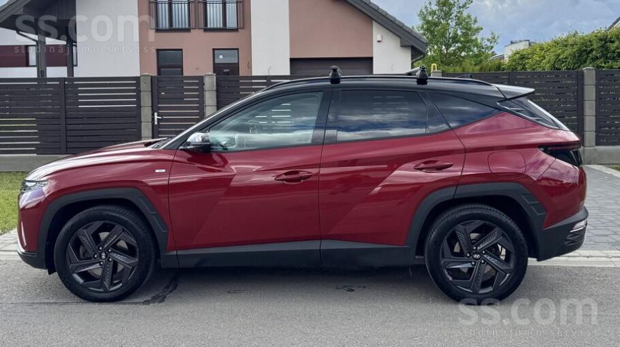 Red Hyundai Tucson 2023 in Riga, with an engine capacity of 1.60 L and mileage of 88 thousand km for 23650 €, photo 7 on AUTOMOTO.COM.LV