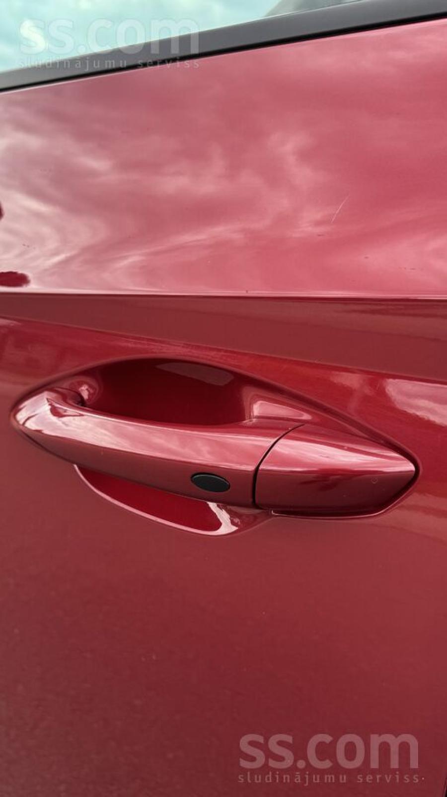 Red Hyundai Tucson 2023 in Riga, with an engine capacity of 1.60 L and mileage of 88 thousand km for 23650 €, photo 11 on AUTOMOTO.COM.LV