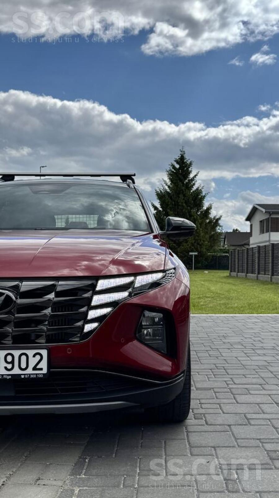 Red Hyundai Tucson 2023 in Riga, with an engine capacity of 1.60 L and mileage of 88 thousand km for 23650 €, photo 36 on AUTOMOTO.COM.LV