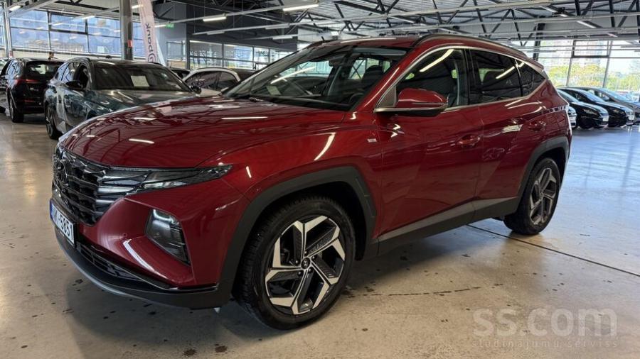 Red Hyundai Tucson 2023 in Riga, with an engine capacity of 1.60 L and mileage of 53 thousand km for 25500 €, photo 1 on AUTOMOTO.COM.LV