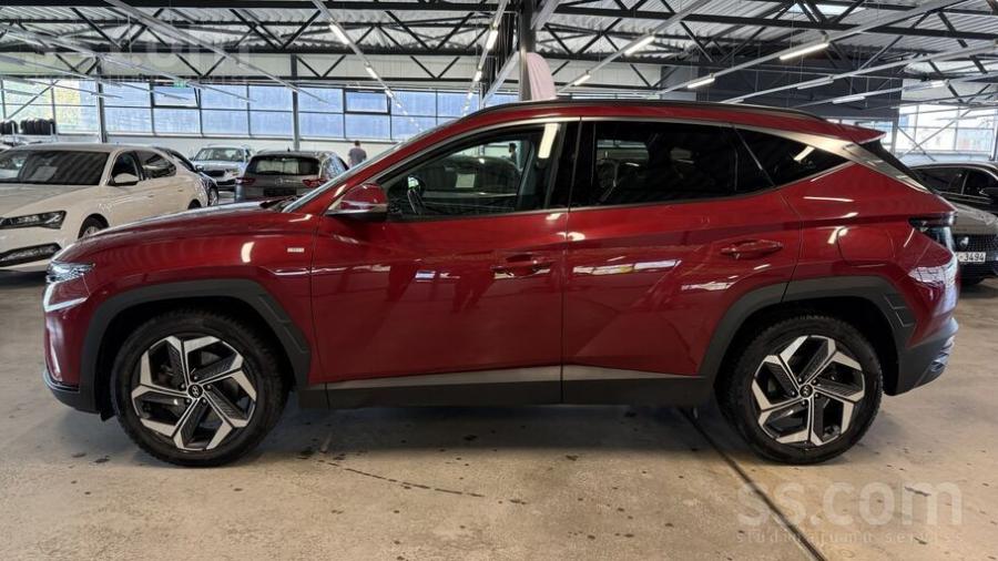 Red Hyundai Tucson 2023 in Riga, with an engine capacity of 1.60 L and mileage of 53 thousand km for 25500 €, photo 3 on AUTOMOTO.COM.LV