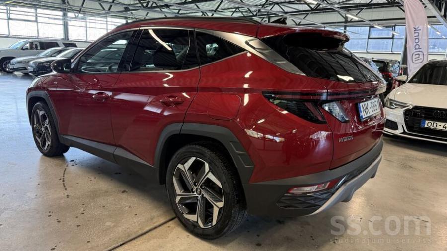Red Hyundai Tucson 2023 in Riga, with an engine capacity of 1.60 L and mileage of 53 thousand km for 25500 €, photo 4 on AUTOMOTO.COM.LV