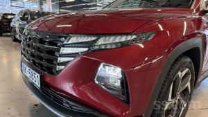 Red Hyundai Tucson 2023 in Riga, with an engine capacity of 1.60 L and mileage of 53 thousand km for 25500 €, photo 9 on AUTOMOTO.COM.LV