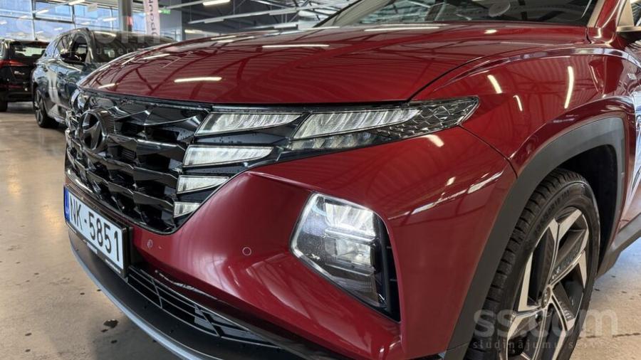 Red Hyundai Tucson 2023 in Riga, with an engine capacity of 1.60 L and mileage of 53 thousand km for 25500 €, photo 9 on AUTOMOTO.COM.LV