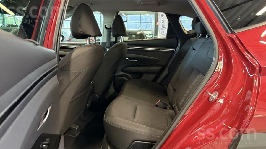 Red Hyundai Tucson 2023 in Riga, with an engine capacity of 1.60 L and mileage of 53 thousand km for 25500 €, photo 13 on AUTOMOTO.COM.LV