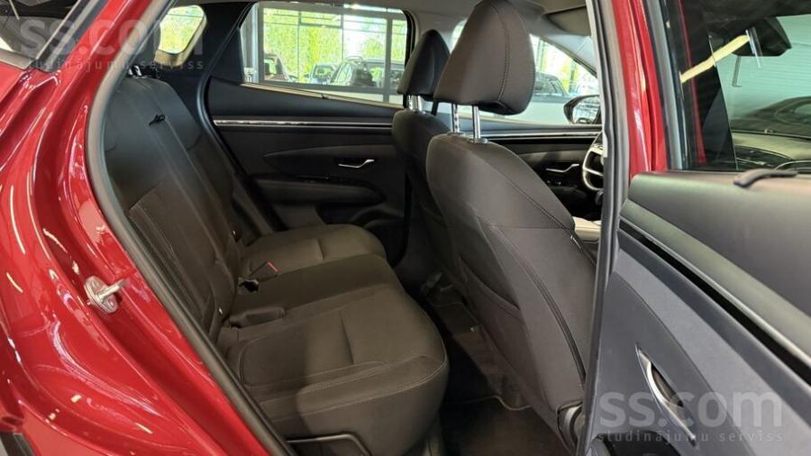 Red Hyundai Tucson 2023 in Riga, with an engine capacity of 1.60 L and mileage of 53 thousand km for 25500 €, photo 16 on AUTOMOTO.COM.LV