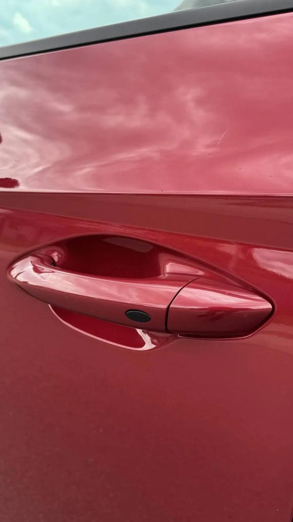 Red Hyundai Tucson 2023 in Riga, with an engine capacity of 1.60 L and mileage of 88 thousand km for 23950 €, photo 10 on AUTOMOTO.COM.LV