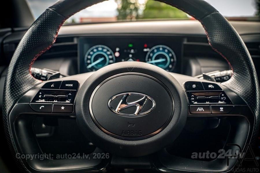 Red Hyundai Tucson 2023 in Riga, with an engine capacity of 1.60 L and mileage of 104 thousand km for 21990 €, photo 14 on AUTOMOTO.COM.LV
