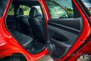 Red Hyundai Tucson 2023 in Riga, with an engine capacity of 1.60 L and mileage of 104 thousand km for 21990 €, photo 18 on AUTOMOTO.COM.LV