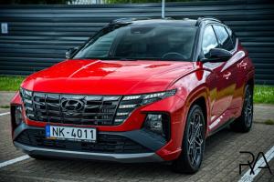Red Hyundai Tucson 2023 in Riga, with an engine capacity of 1.60 L and mileage of 104 thousand km for 21990 €, photo  on AUTOMOTO.COM.LV