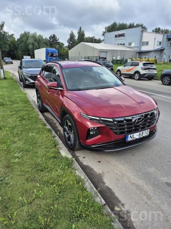Red Hyundai Tucson 2023 in Riga, with an engine capacity of 1.60 L and mileage of 44 thousand km for 24900 €, photo 3 on AUTOMOTO.COM.LV