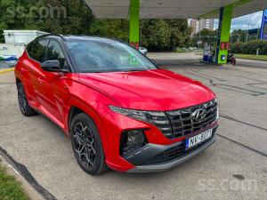 Red Hyundai Tucson 2024 in Riga, with an engine capacity of 1.60 L and mileage of 36 thousand km for 29500 €, photo  on AUTOMOTO.COM.LV