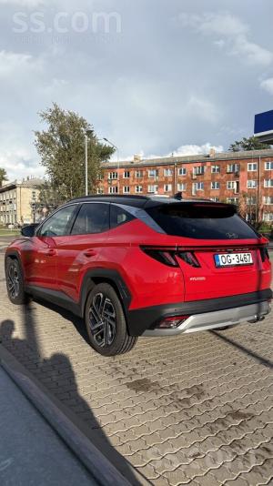 Red Hyundai Tucson 2025 in Riga, with an engine capacity of 1.60 L and mileage of 11 thousand km for 29990 €, photo 1 on AUTOMOTO.COM.LV