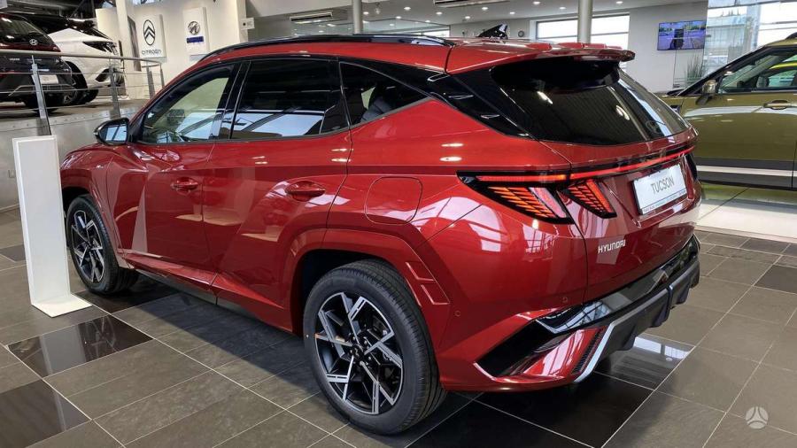Red Hyundai Tucson 2026 in Vilnius, with an engine capacity of 1.60 L and mileage of 0 thousand km for 36999 €, photo 6 on AUTOMOTO.COM.LV