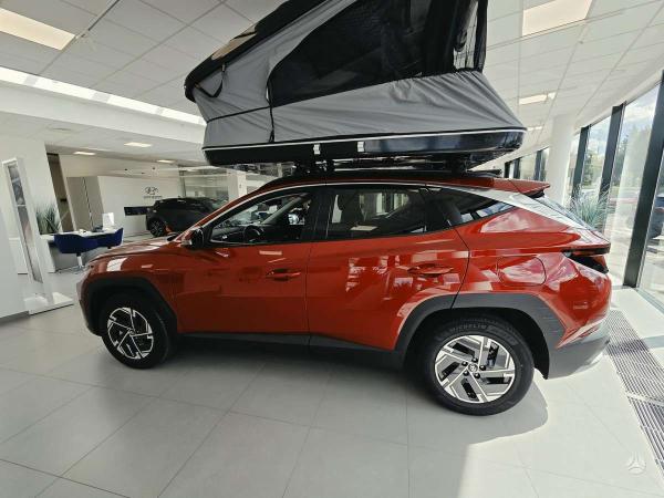 Red Hyundai Tucson 2026 in Vilnius, with an engine capacity of 1.60 L and mileage of 0 thousand km for 36950 €, photo 3 on AUTOMOTO.COM.LV
