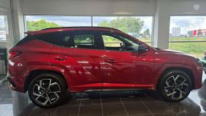 Red Hyundai Tucson 2026 in Kaunas, with an engine capacity of 1.60 L and mileage of 0 thousand km for 38999 €, photo 5 on AUTOMOTO.COM.LV