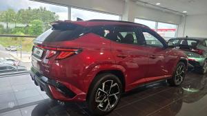Red Hyundai Tucson 2026 in Kaunas, with an engine capacity of 1.60 L and mileage of 0 thousand km for 38999 €, photo 7 on AUTOMOTO.COM.LV