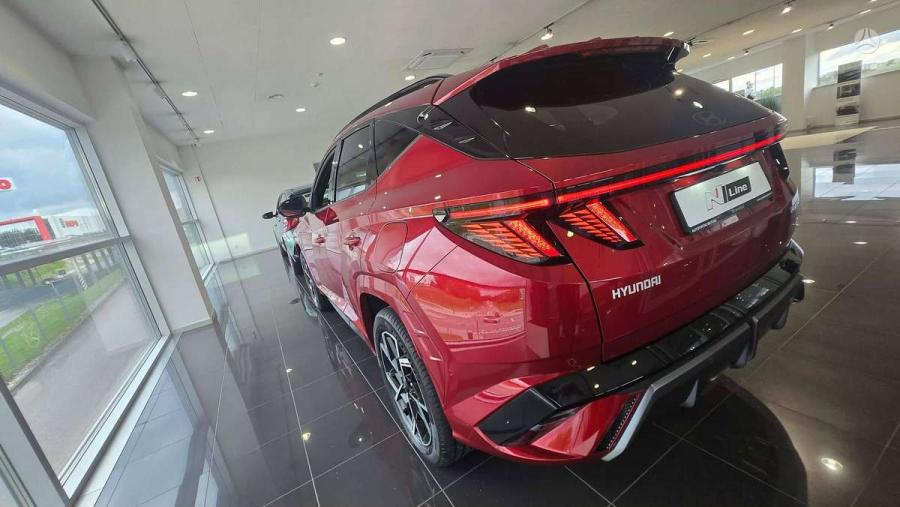Red Hyundai Tucson 2026 in Kaunas, with an engine capacity of 1.60 L and mileage of 0 thousand km for 38999 €, photo 8 on AUTOMOTO.COM.LV