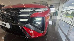 Red Hyundai Tucson 2026 in Kaunas, with an engine capacity of 1.60 L and mileage of 0 thousand km for 38999 €, photo 9 on AUTOMOTO.COM.LV