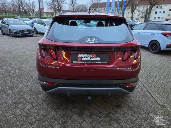 Red Hyundai Tucson 2021 in Kaunas, with an engine capacity of 1.60 L and mileage of 57 thousand km for 23420 €, photo 5 on AUTOMOTO.COM.LV