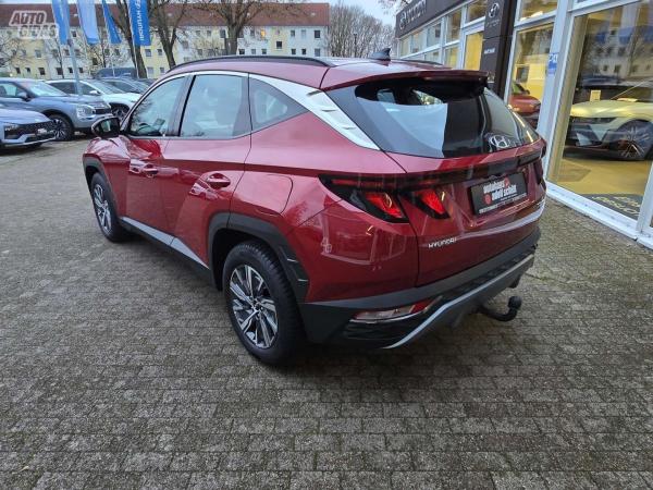 Red Hyundai Tucson 2021 in Kaunas, with an engine capacity of 1.60 L and mileage of 57 thousand km for 23420 €, photo 6 on AUTOMOTO.COM.LV