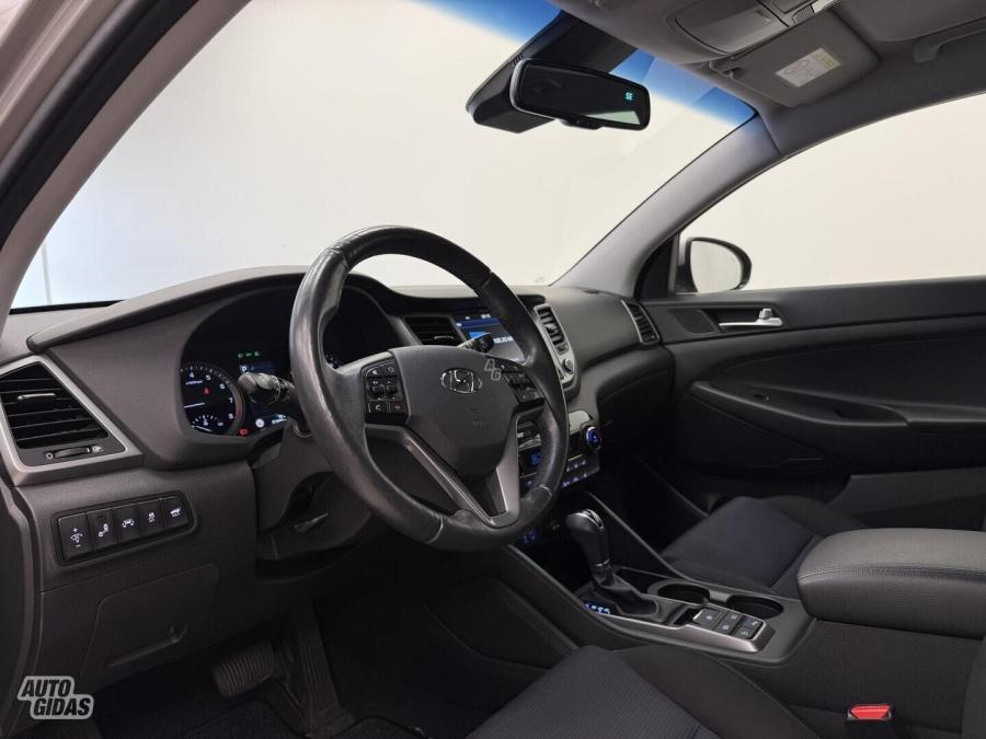 White Hyundai Tucson 2017 in Vilnius, with an engine capacity of 1.60 L and mileage of 92 thousand km for 13990 €, photo 11 on AUTOMOTO.COM.LV