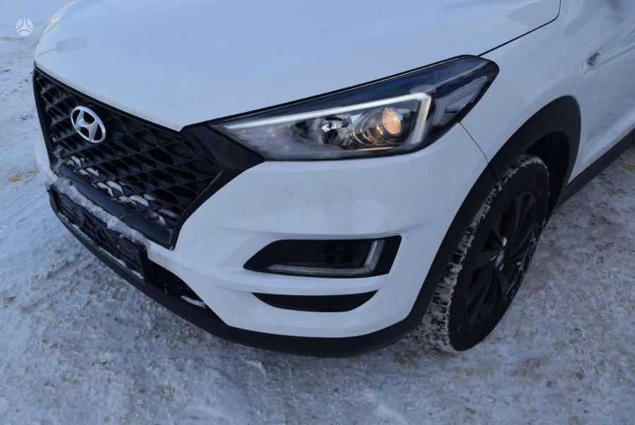 White Hyundai Tucson 2018 in Vilnius, with an engine capacity of 1.59 L and mileage of 116 thousand km for 14950 €, photo 23 on AUTOMOTO.COM.LV