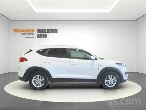 White Hyundai Tucson 2019 in Riga, with an engine capacity of 1.60 L and mileage of 64 thousand km for 13990 €, photo 8 on AUTOMOTO.COM.LV